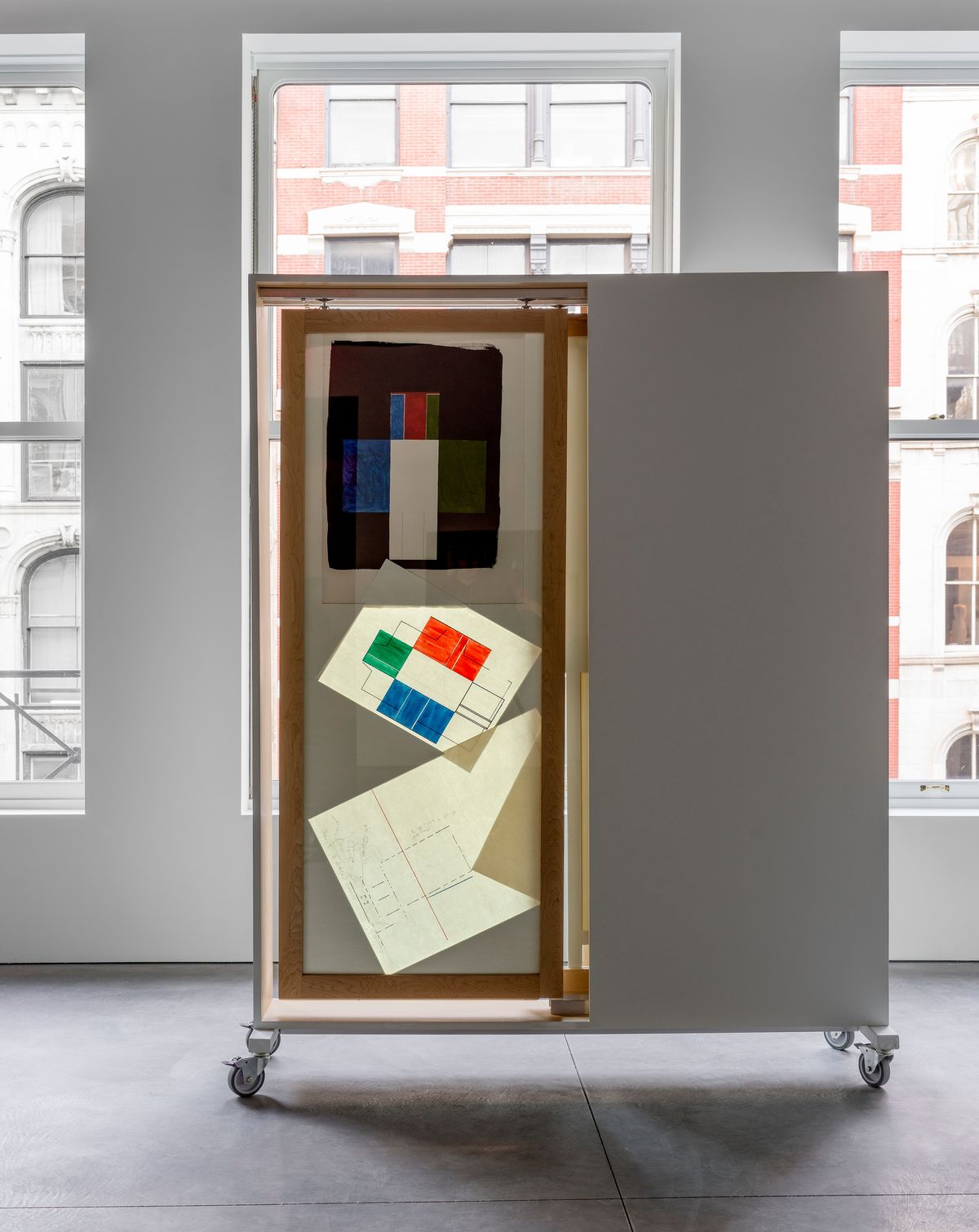 A collage showing of three drawings temporarily placed in a box, 1983 ...